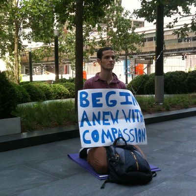 Guy Meditating Outside Goldman Sachs Is Having Trouble Getting His Om On