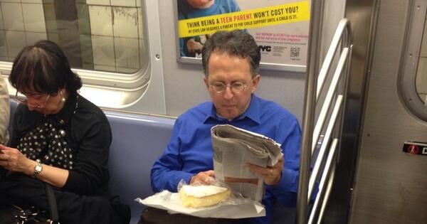 Otherwise Respectable Man Devours Massive Piece of Brie on Subway