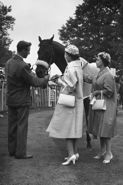 See Queen Elizabeth With Corgis, a Panda, Elephants, and Other Animals