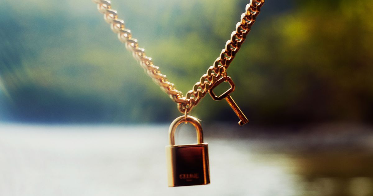 Shop Celine’s Gold Lock and Key Charm Necklace