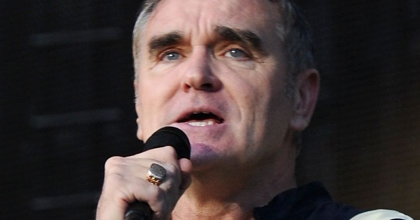 Morrissey Models Like He Does Everything: Miserably