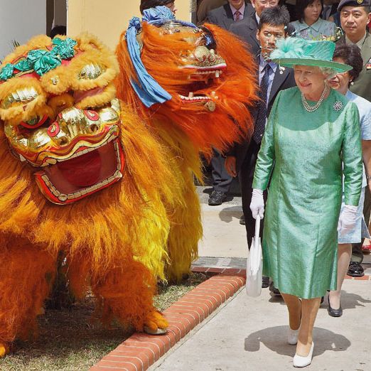 See Queen Elizabeth With Corgis, a Panda, Elephants, and Other Animals