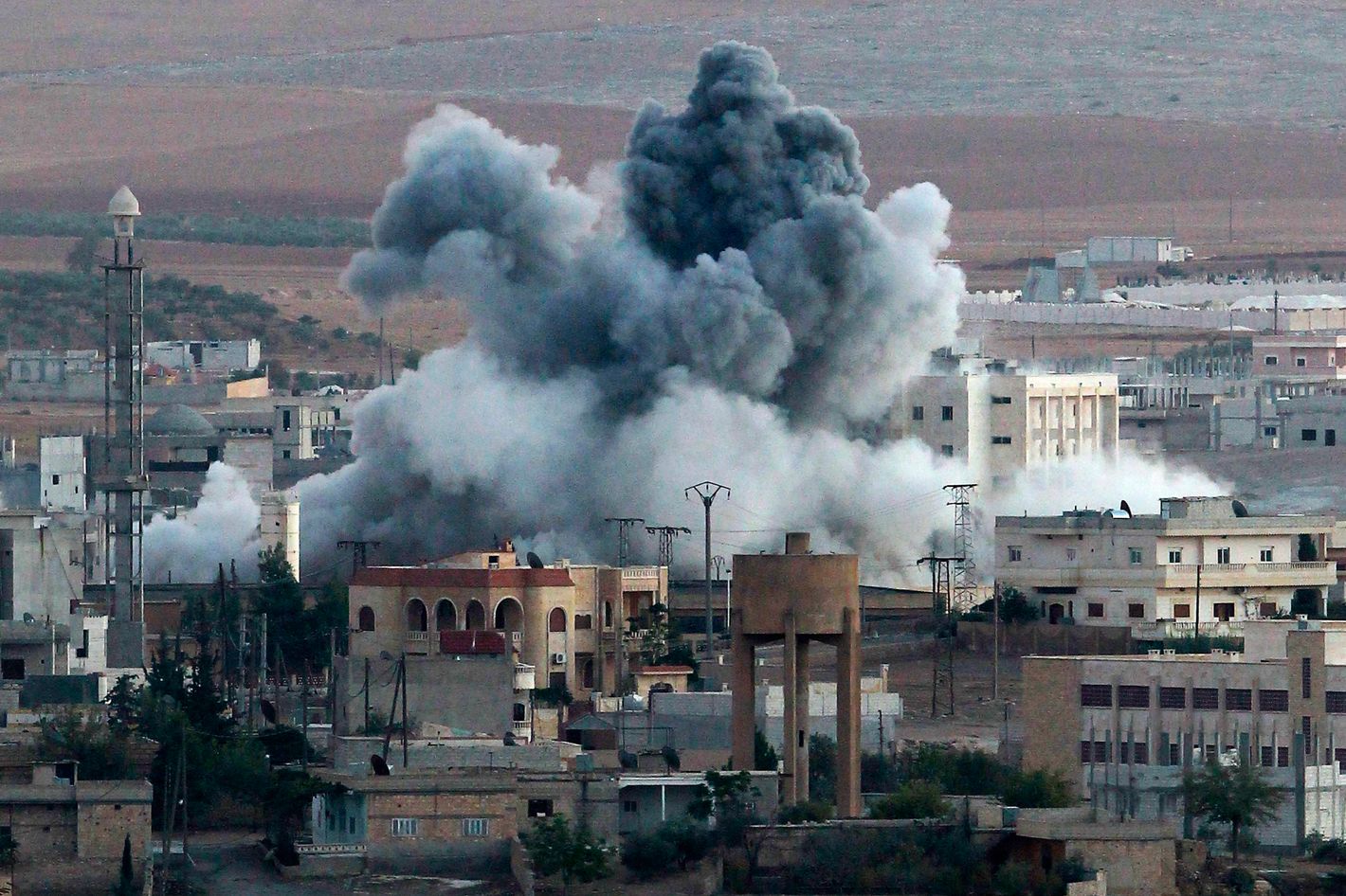ISIS Advances on Kobani, in Photos