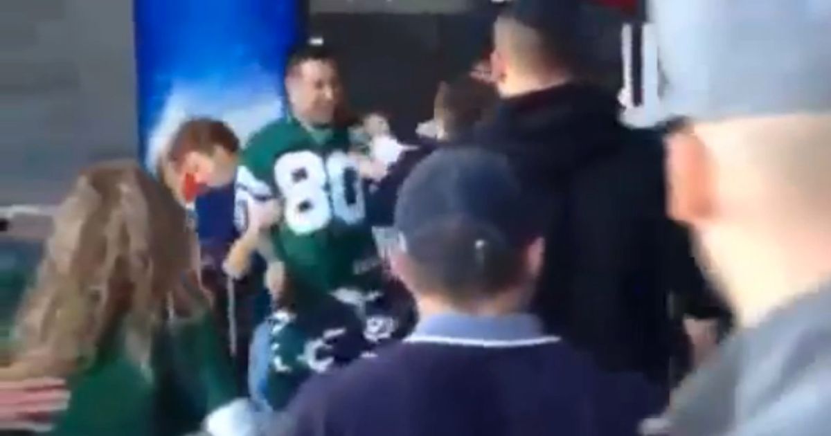 Male Jets Fan Celebrates Win Over Patriots by Punching Woman in the Face