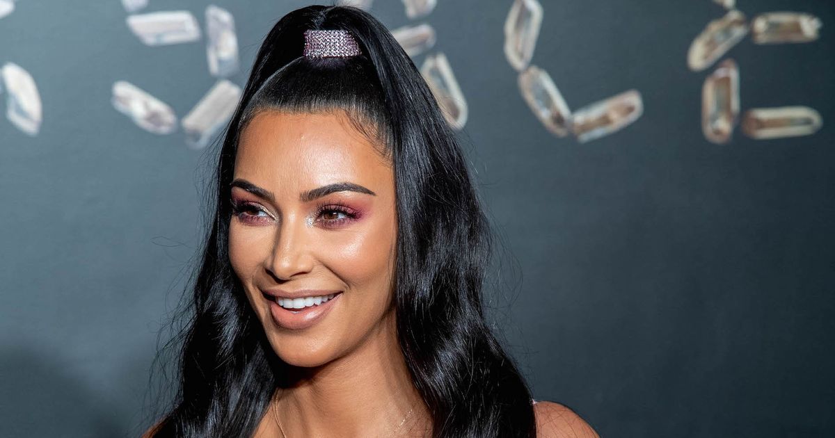 Kim Kardashian Covers Sunburn With KKW Body Foundation