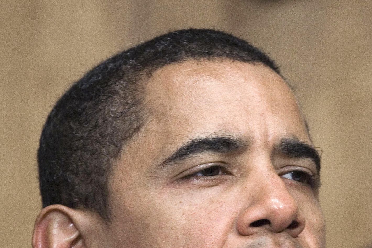 A History of President Obama Pressing Two Fingers to His Lips