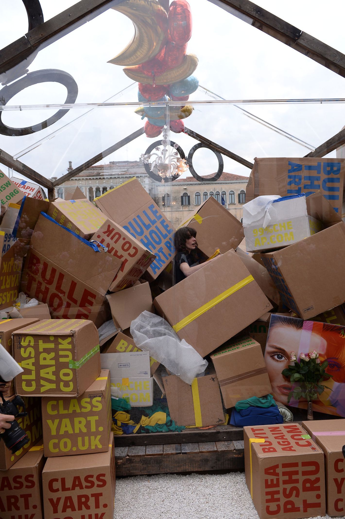 Milla Jovovich Was Buried Under Boxes in a Glass House