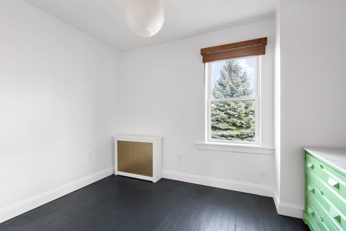 A Customized Glendale House With a Bright-Red Staircase