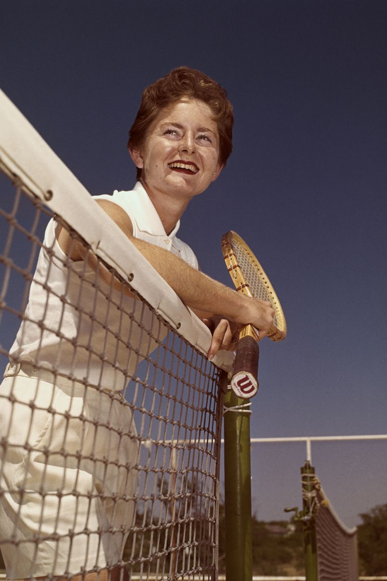 Ladies Looking Glamorous Posing With Tennis Racquets