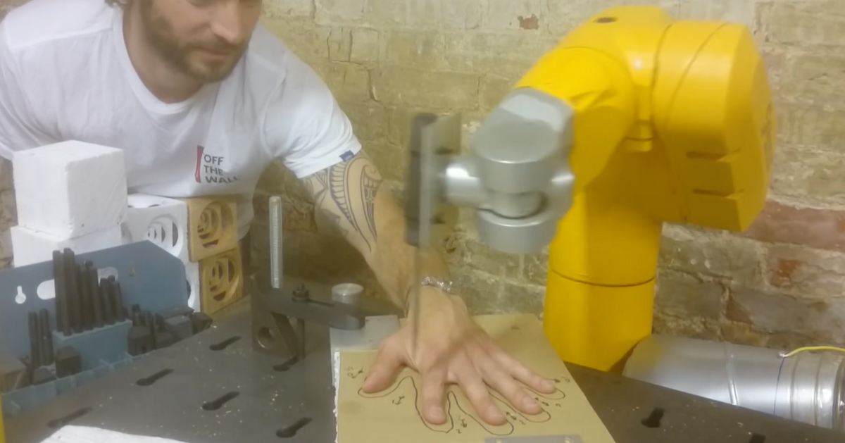 Robot Stabs Around Man's Hand With Knife