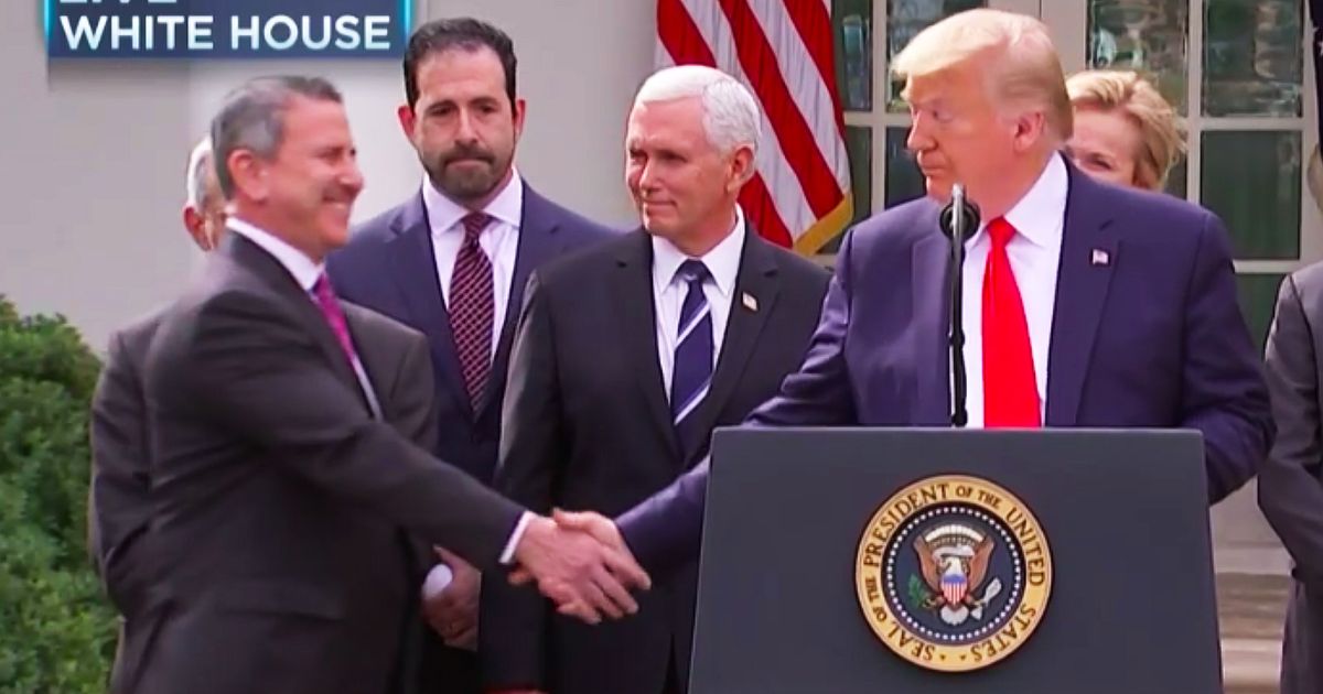 President Trump Shakes Hands at Coronavirus Briefing