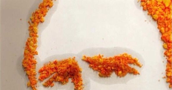 See Louis C.K.’s Face Made Out of Cheetos