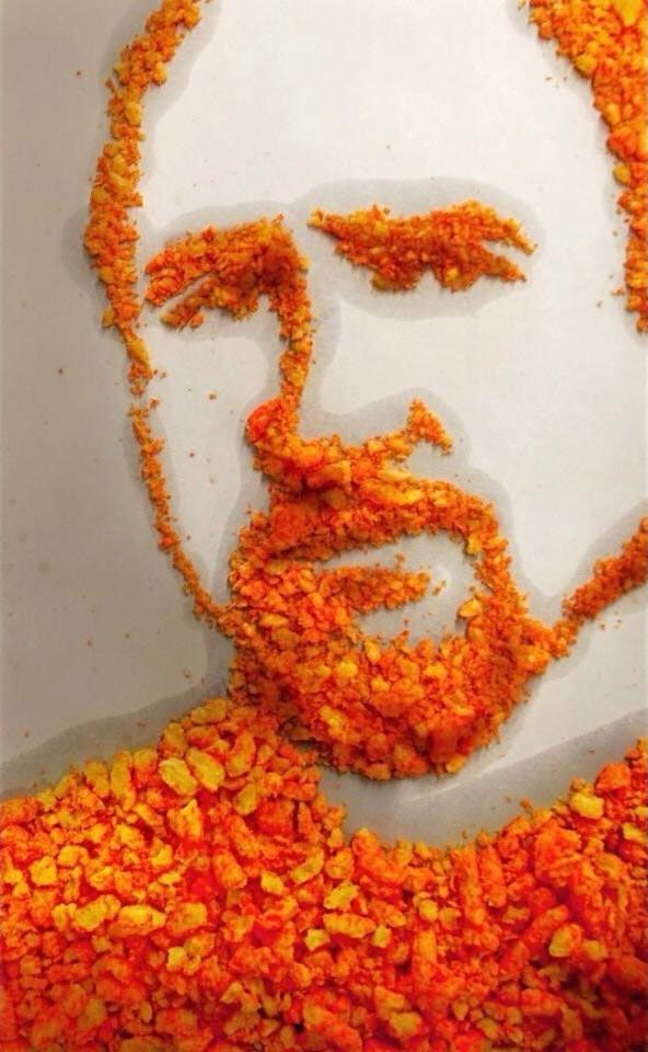 See Louis C.K.’s Face Made Out of Cheetos