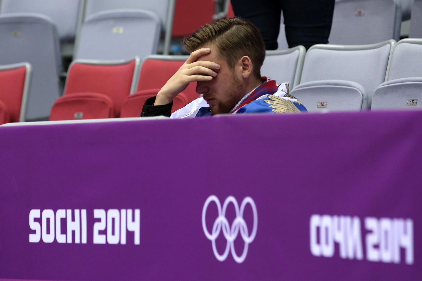 9 Photos of Sad Russian Hockey Fans in Sochi
