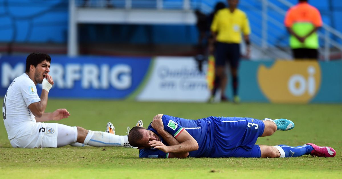 See Uruguay’s Luis Suárez Bite an Opponent at the World Cup