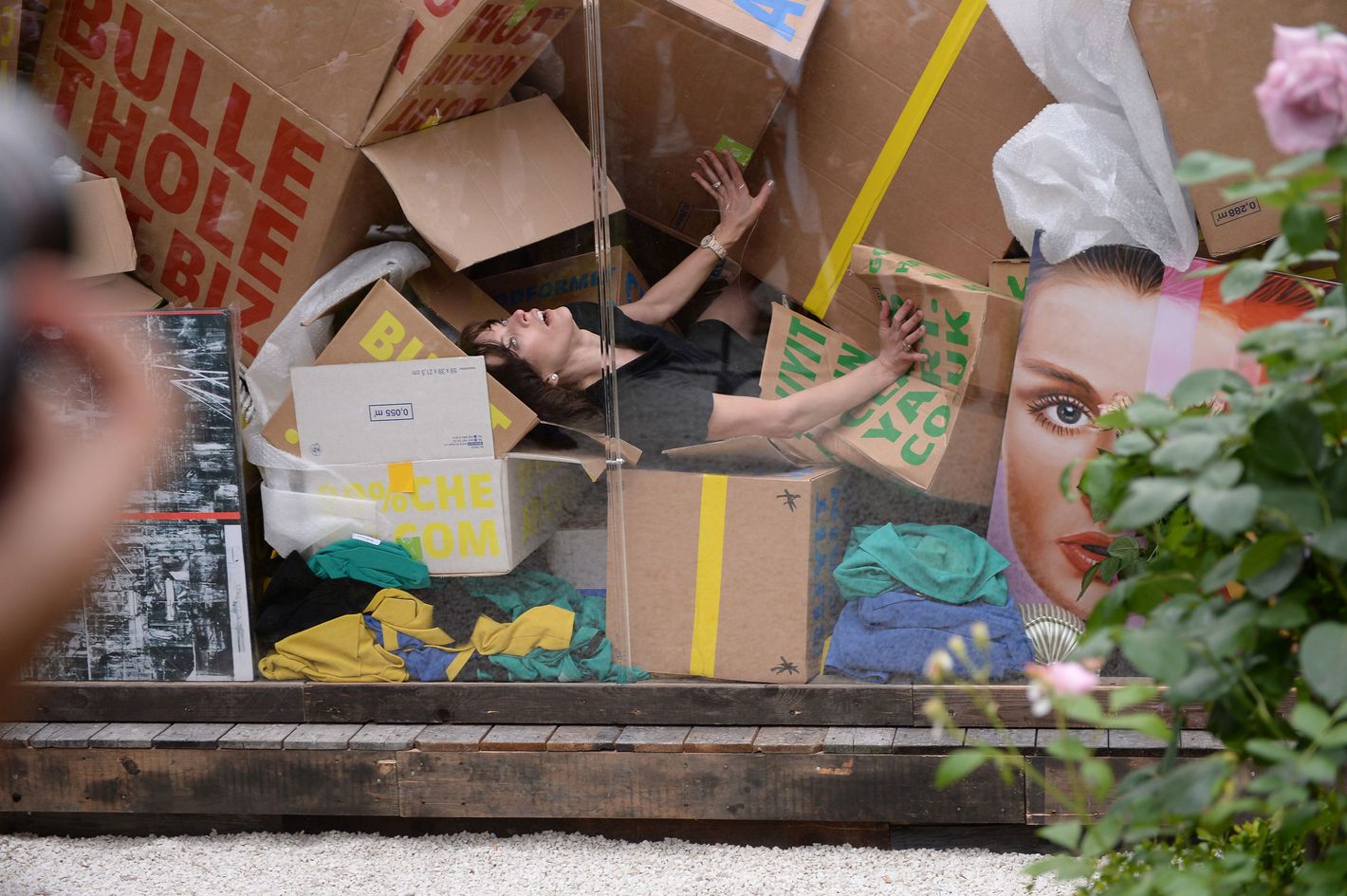 Milla Jovovich Was Buried Under Boxes in a Glass House