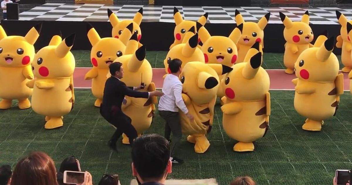 Deflating Pikachu Rescued by Men in Suits