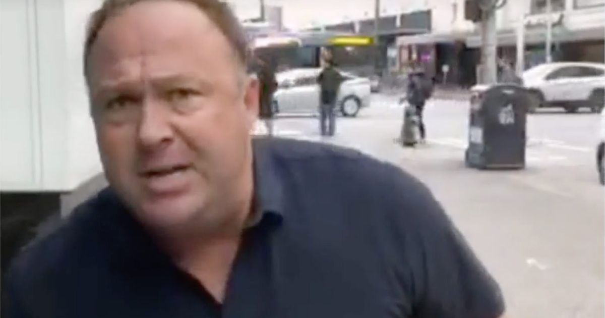 Alex Jones Got Coffee Dumped on Him by Pedestrian in Seattle