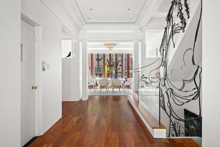 A Lenox Hill Townhouse With an Eccentric Sculptural Railing