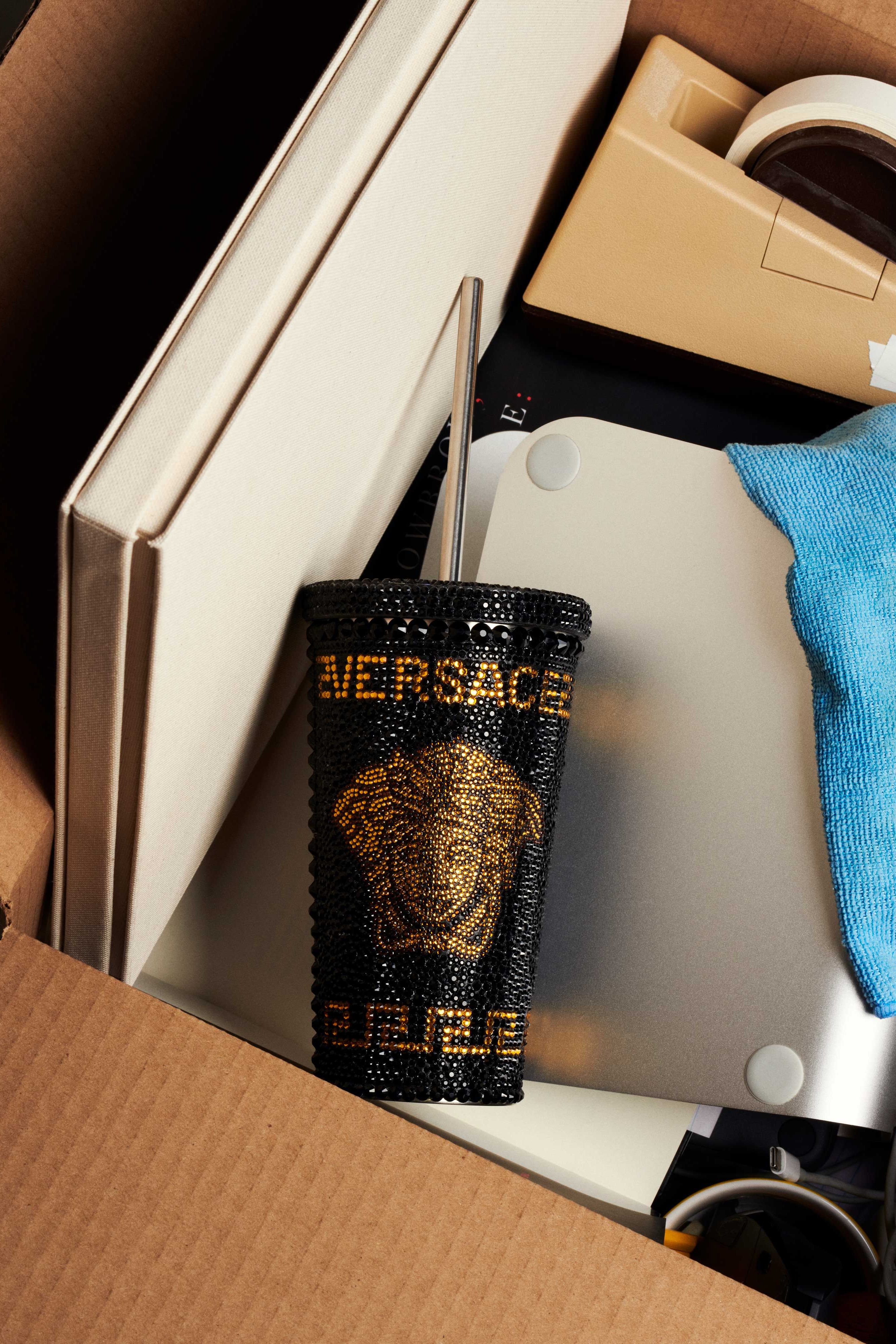 Drinking From a Balenciaga Coffee Cup or Dior Water Bottle