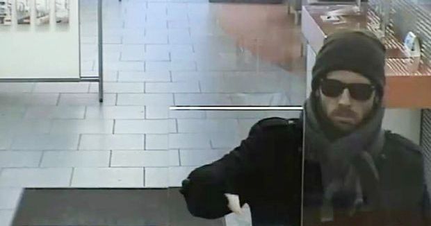 Stylish Bank Robber Apparently Spending a Lot of That Stolen Cash on ...